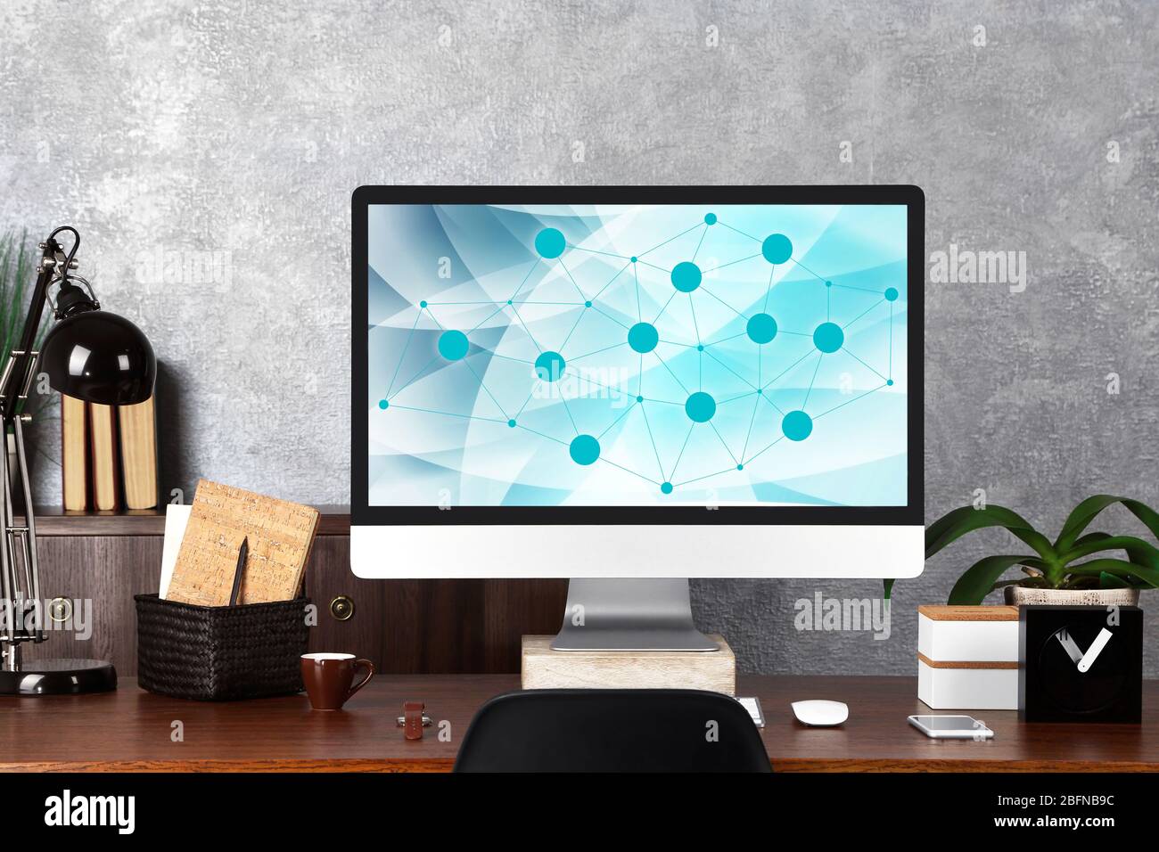 Modern workplace with computer. Network design on screen Stock Photo ...