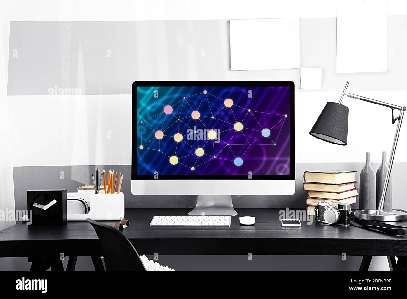 Modern workplace with computer. Network design on screen Stock Photo ...