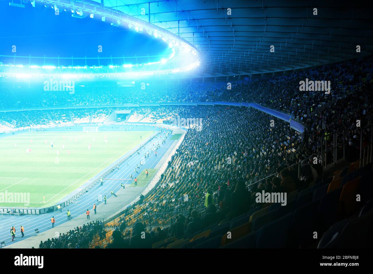 Football stadium background. Crowd at soccer match Stock Photo - Alamy