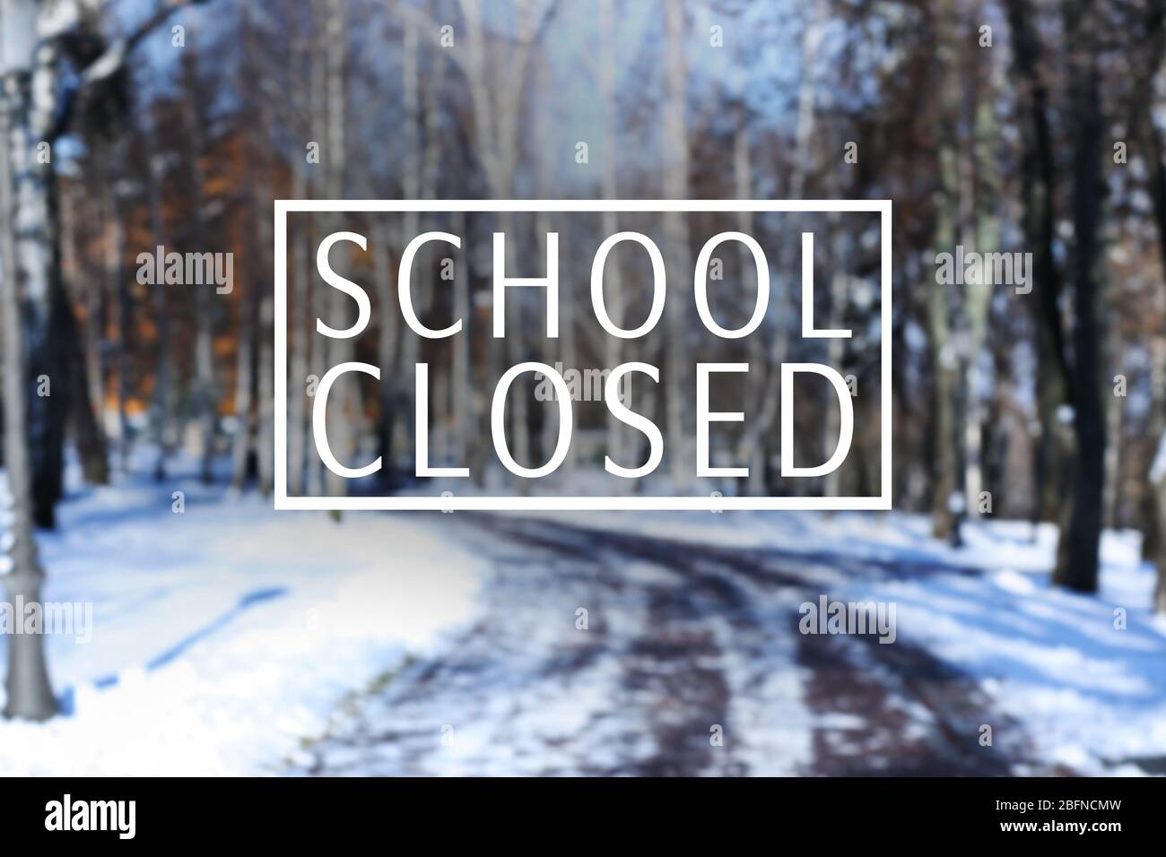 Text SCHOOL CLOSED on winter nature background Stock Photo - Alamy