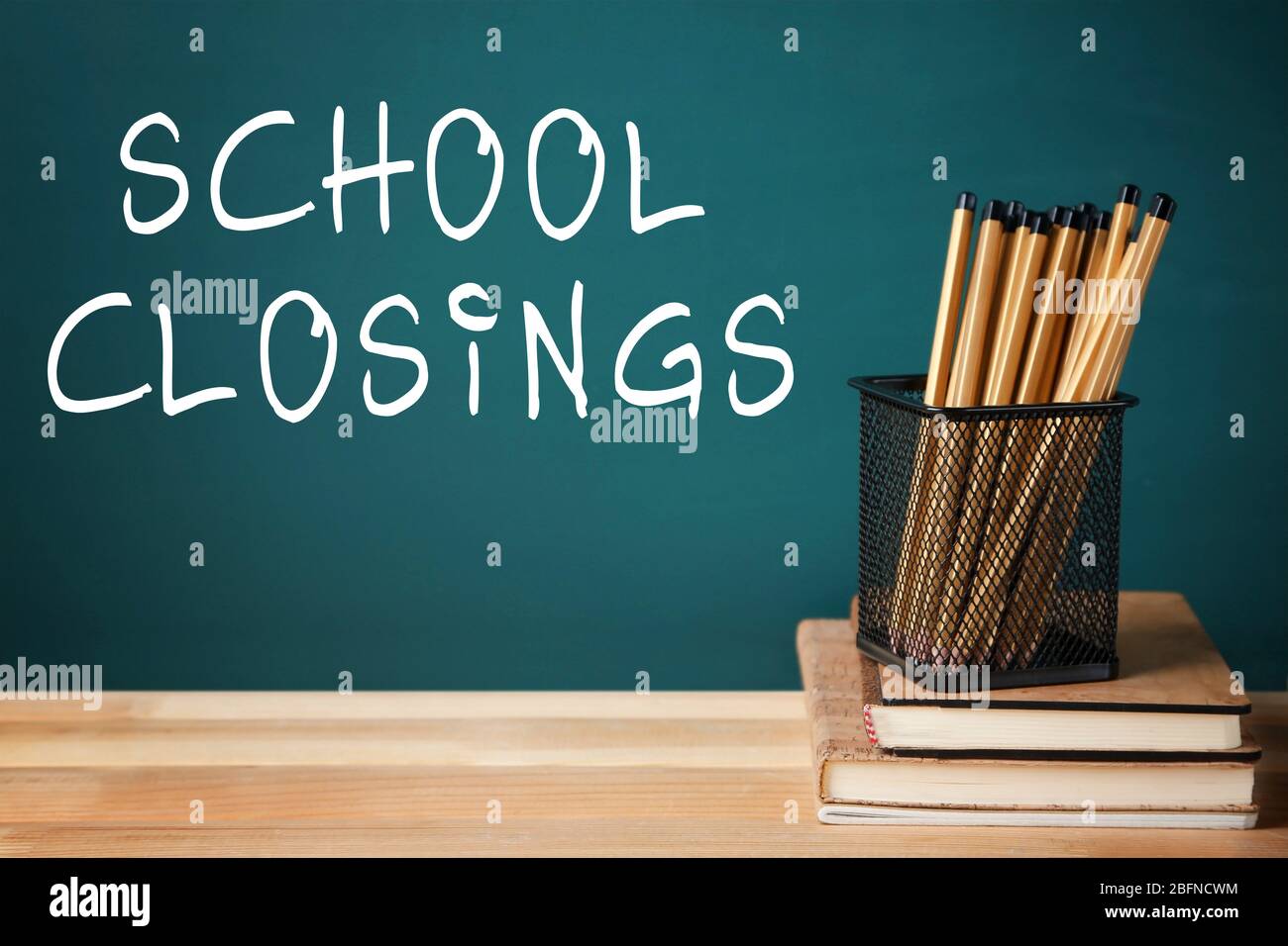 Books and stationery on chalkboard background with text SCHOOL CLOSINGS ...