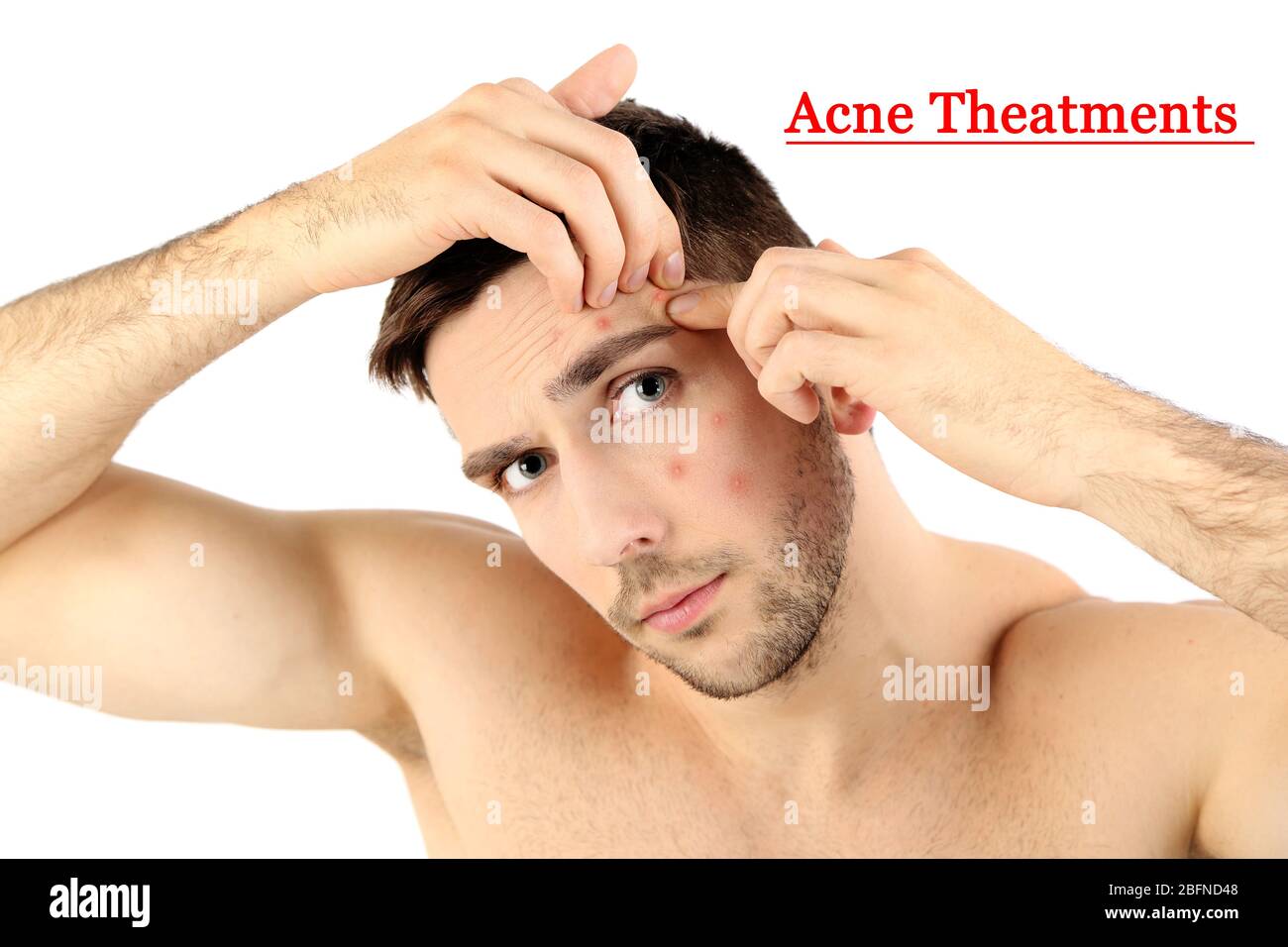 Skin care concept. Young man squeezing pimple, white background Stock ...