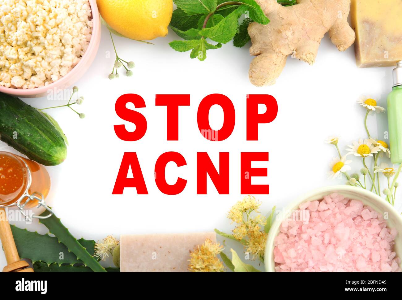 Ingredients for natural facial treatment and text STOP ACNE on white ...