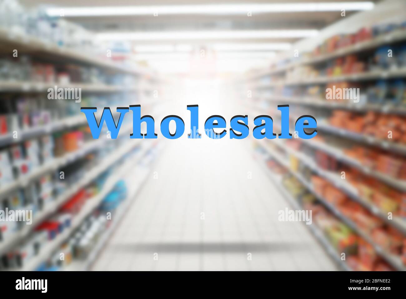 Word WHOLESALE on blurred supermarket background Stock Photo - Alamy