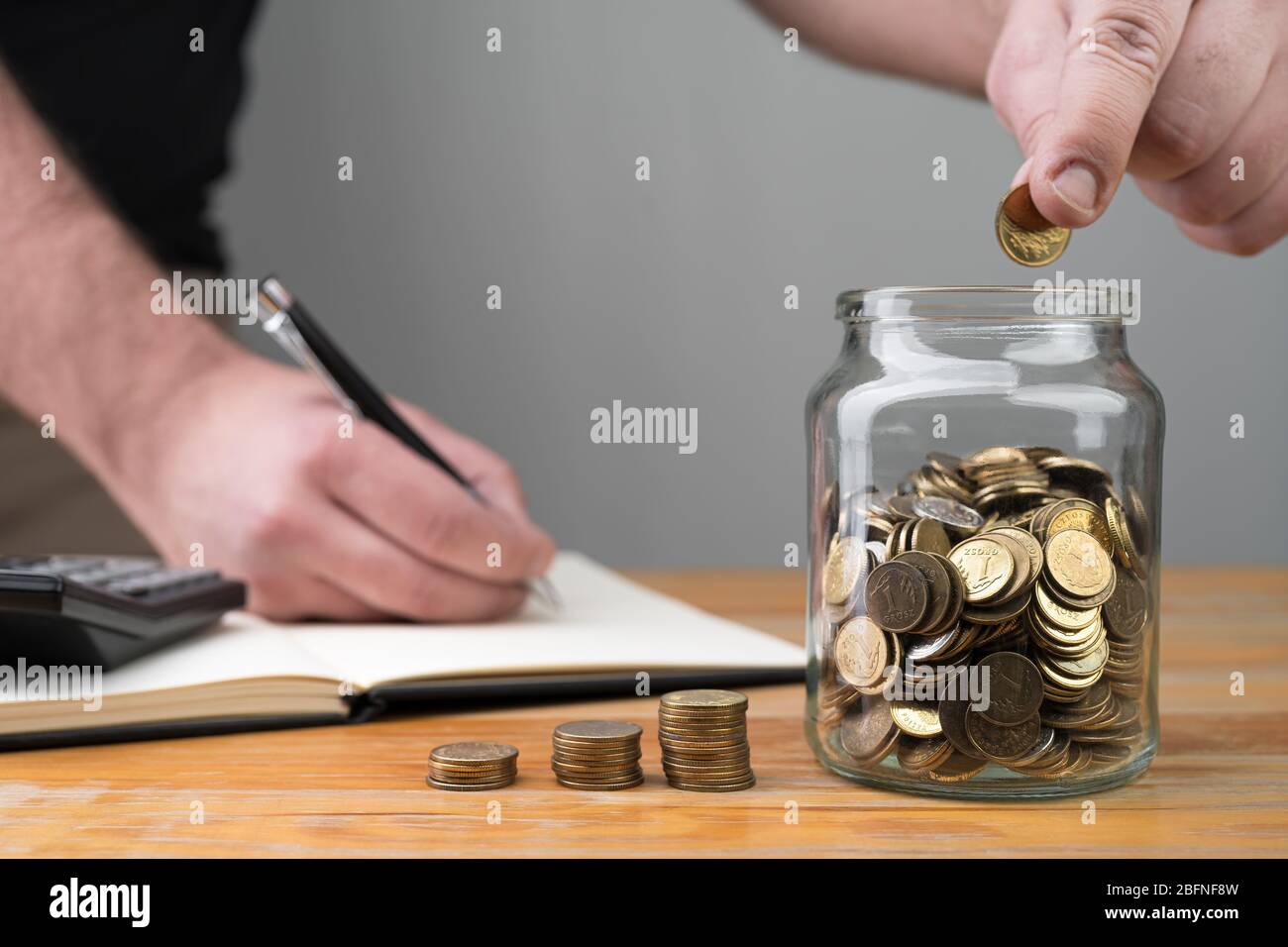 Dropping Money High Resolution Stock Photography and Images - Alamy