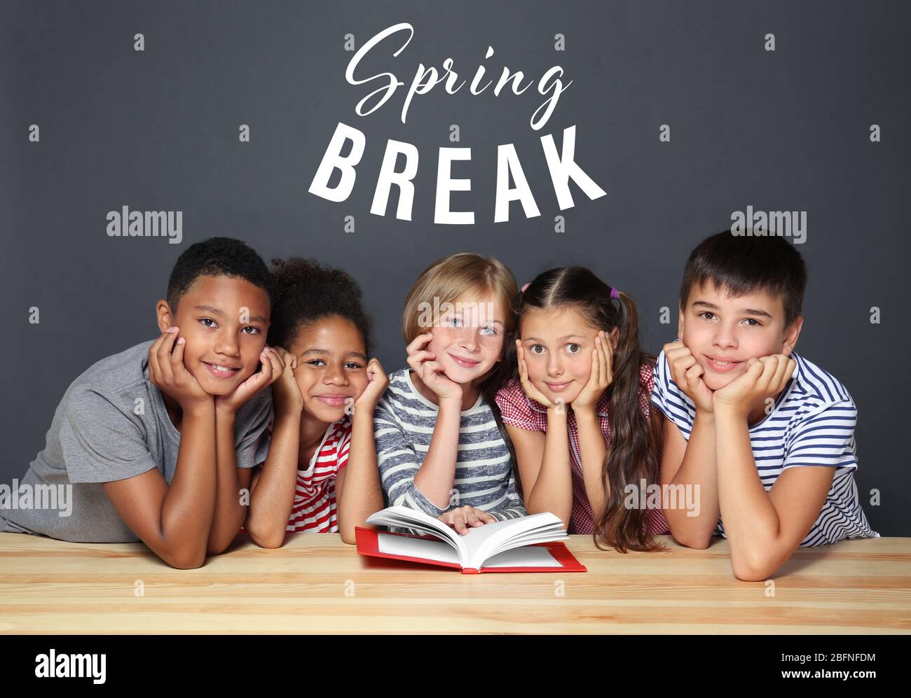 Text SPRING BREAK and children with book on dark background. Additional ...