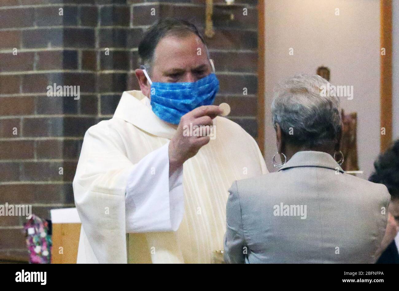 Maryland Heights, United States. 19th Apr, 2020. Rev. Bob Evans gives ...