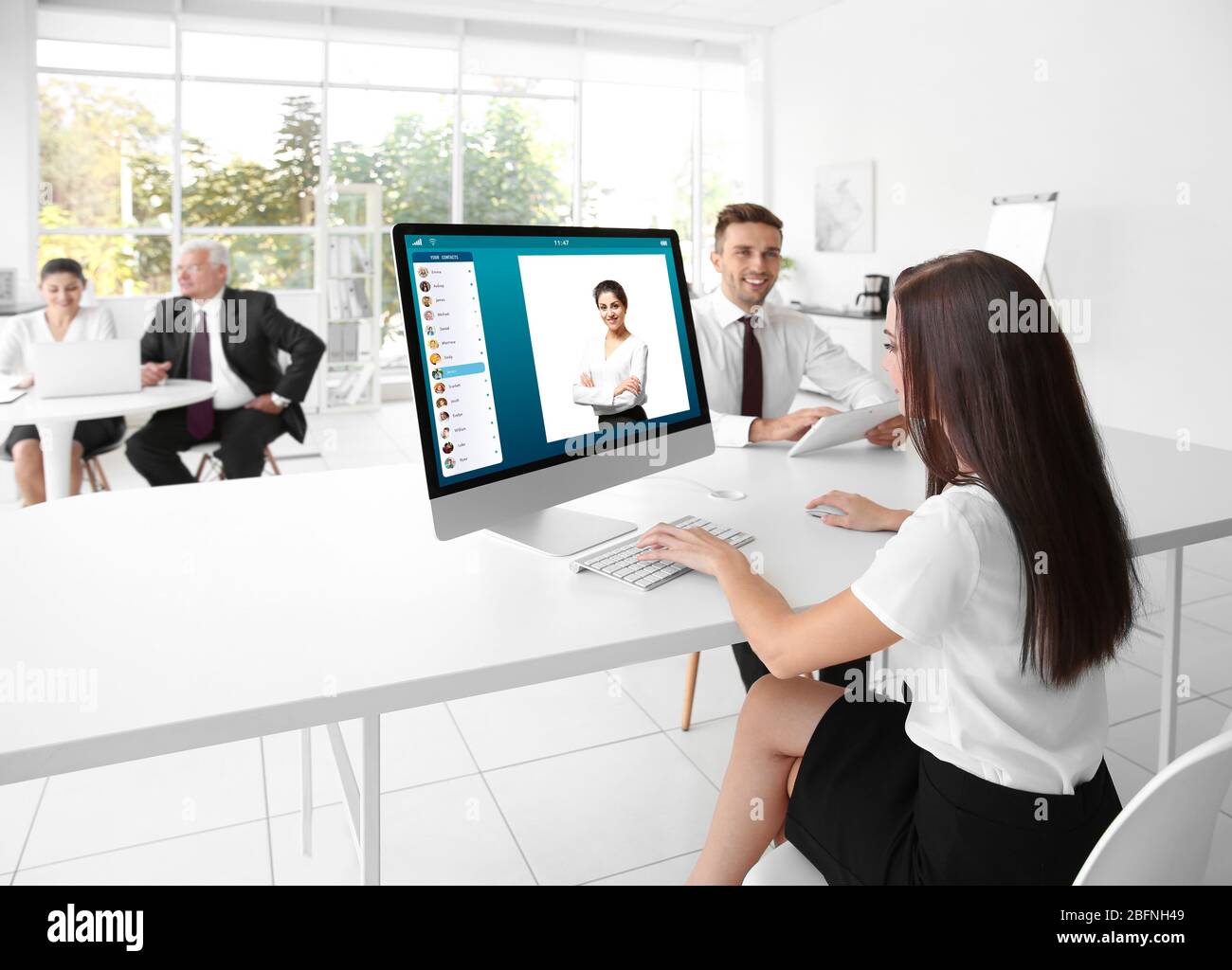 Woman video conferencing with lawyer on computer. Video call and online ...