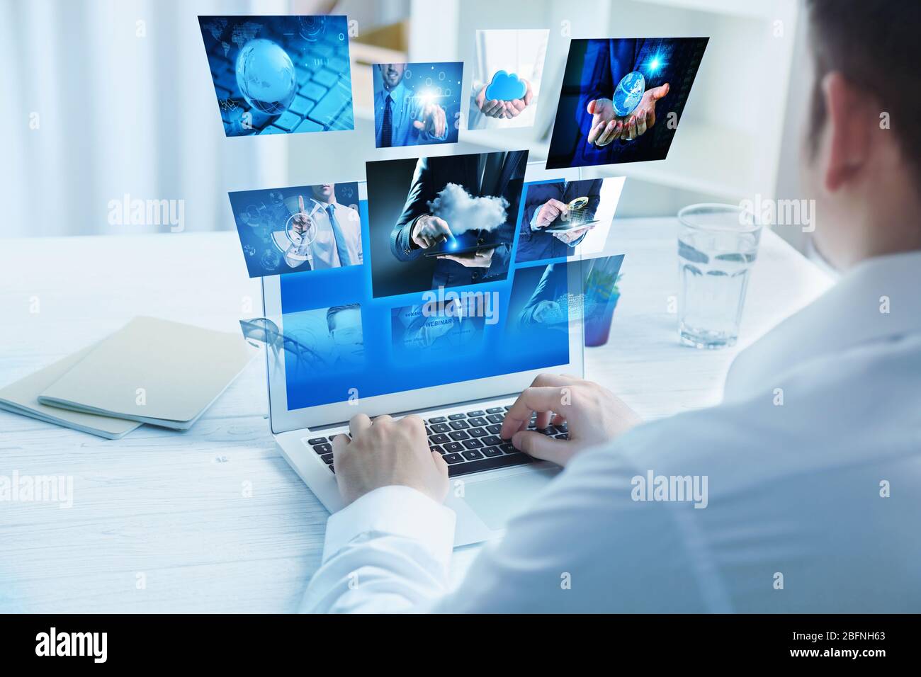 Internet and modern technology concept. Man working with laptop Stock ...