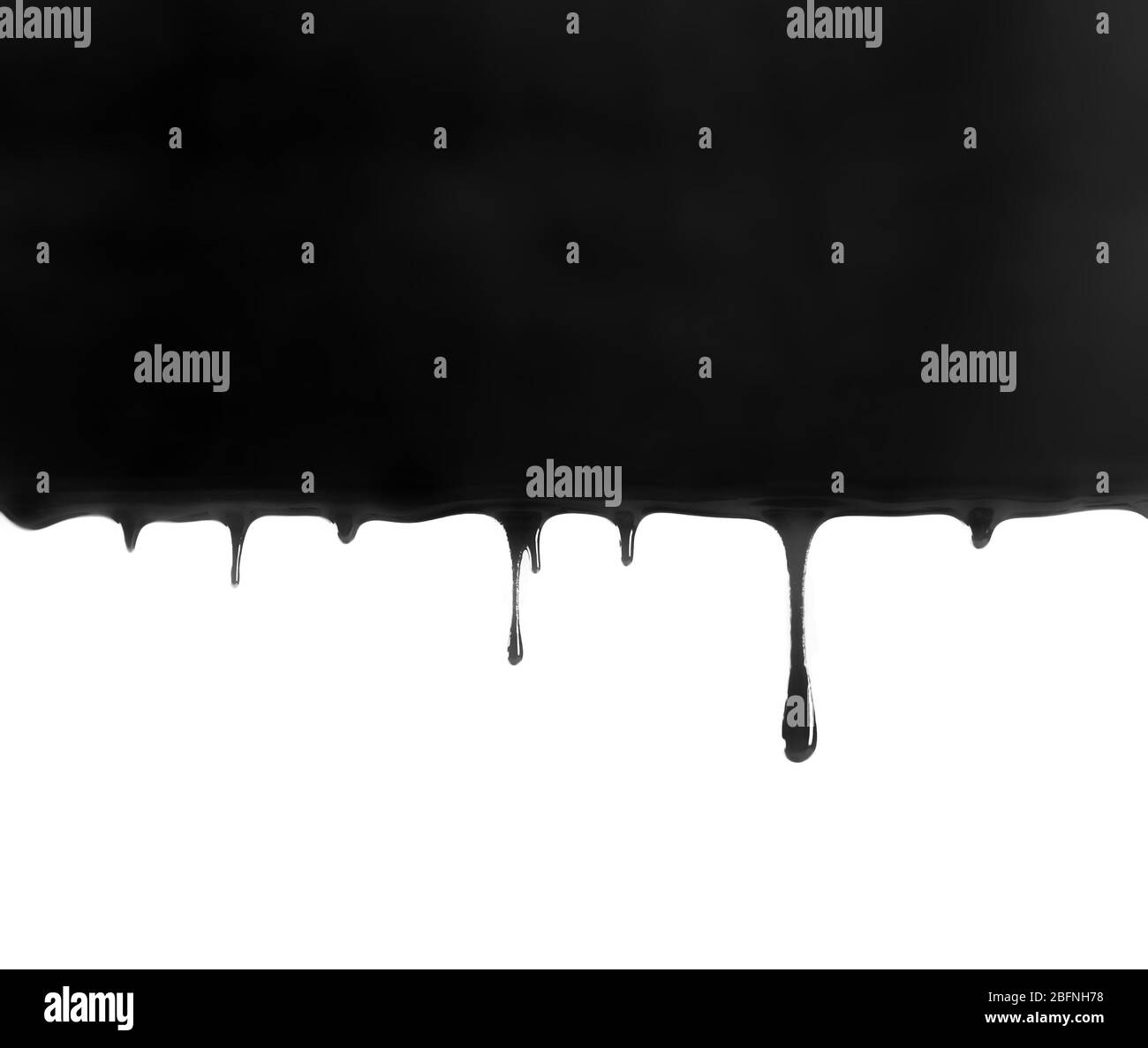 Black fluid on white background Stock Photo - Alamy
