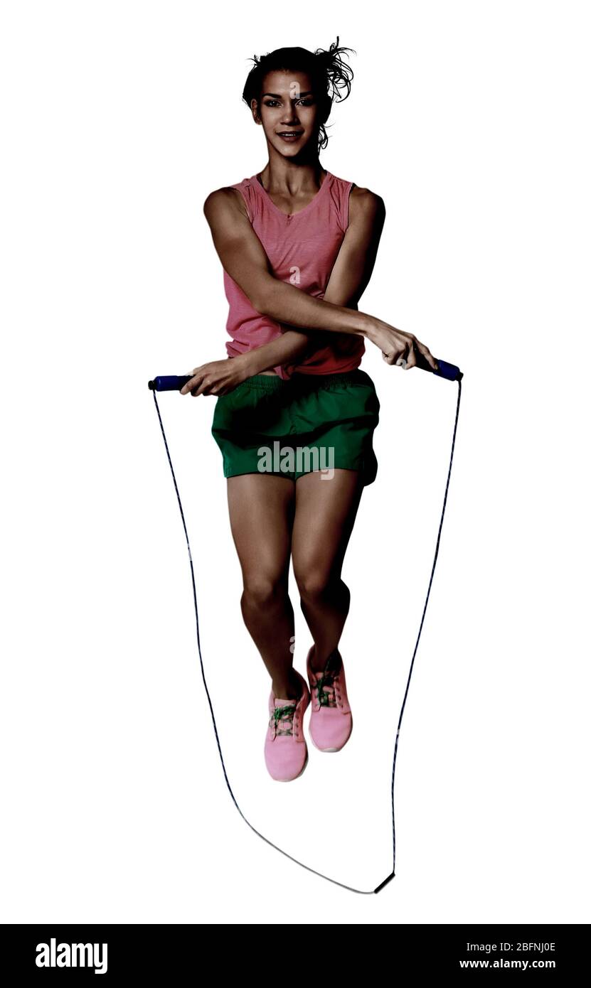 Young woman with jumping rope on white background Stock Photo - Alamy