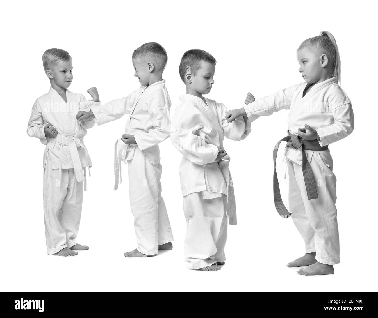 Little children practising karate on white background Stock Photo - Alamy