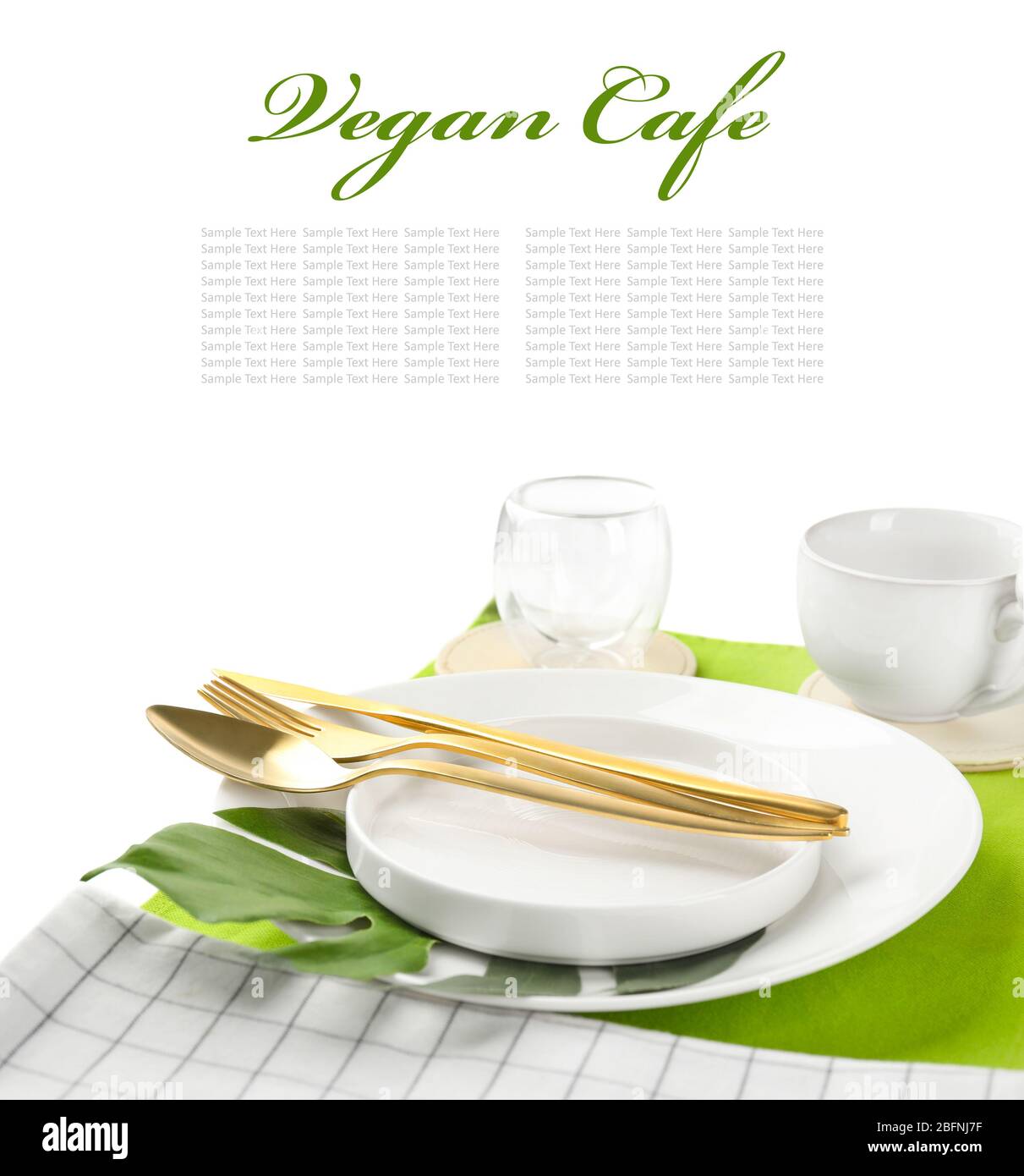 Table setting and text VEGAN CAFE on white background Stock Photo - Alamy