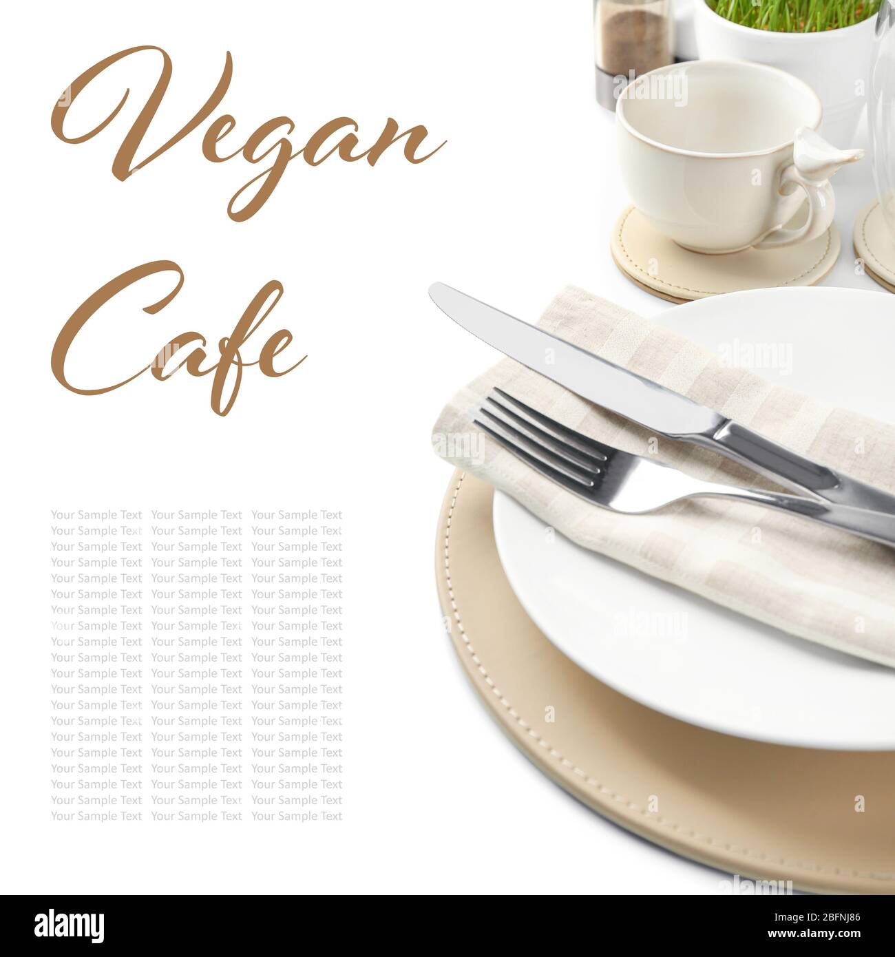 Table setting and text VEGAN CAFE on white background Stock Photo - Alamy
