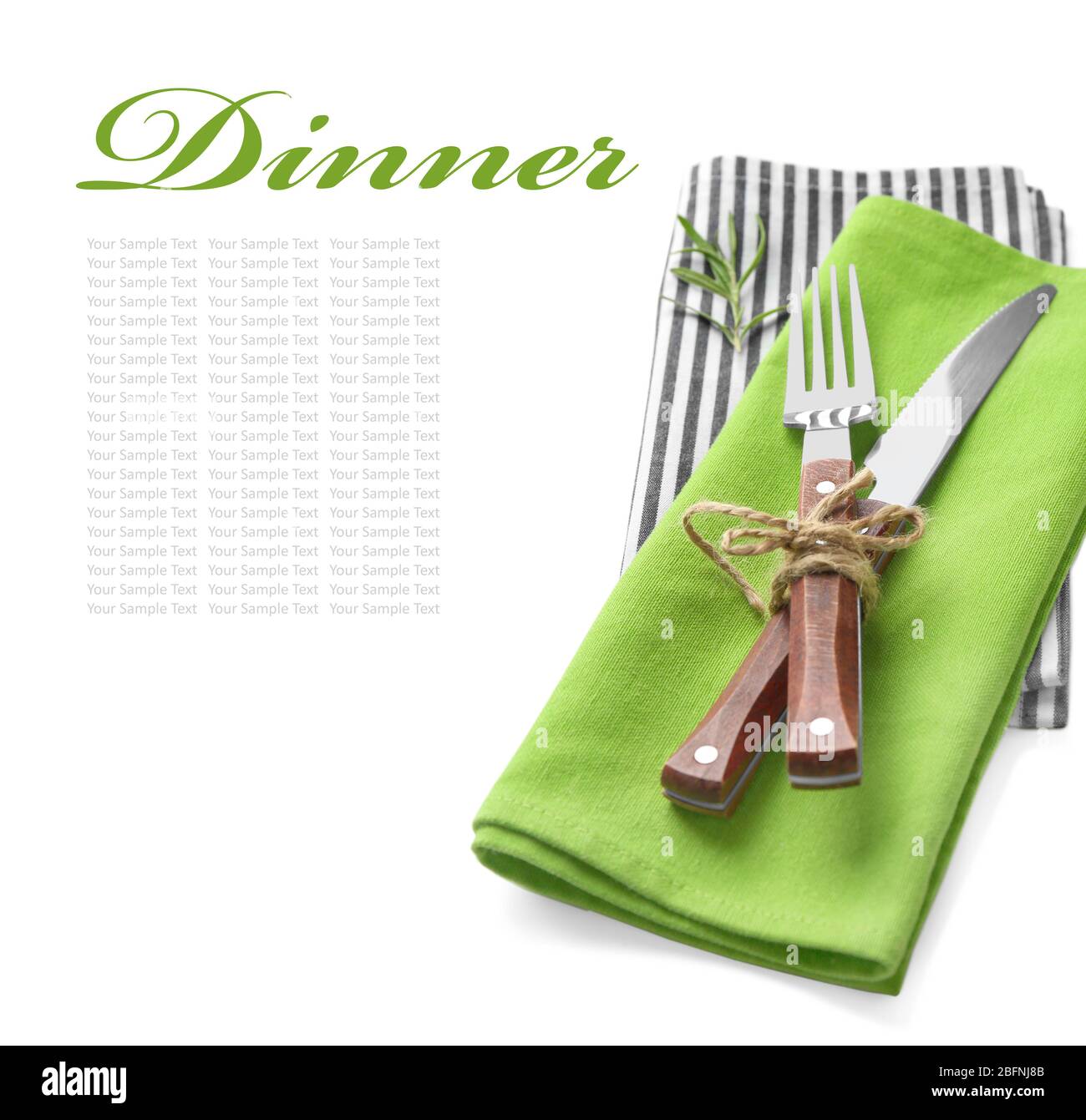 Cutlery and word DINNER on white background Stock Photo - Alamy