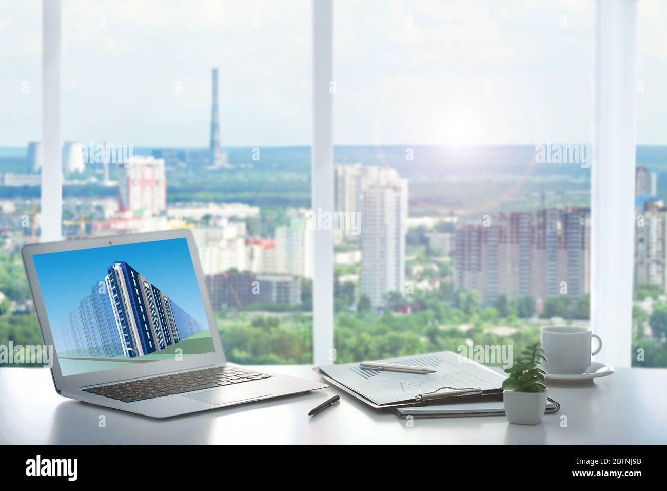 Workplace of insurance broker in office with view on cityscape Stock ...