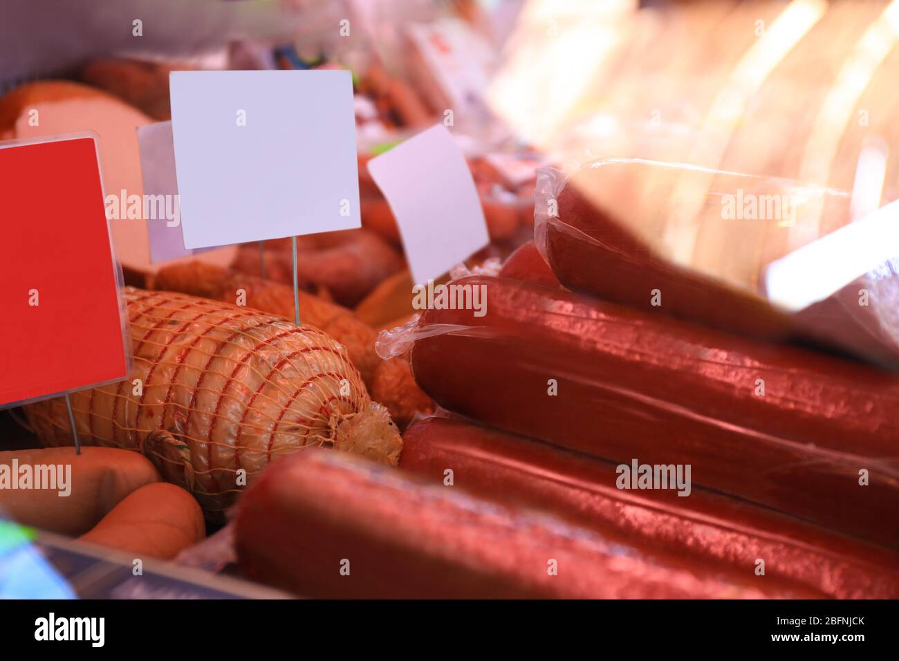 Assortment of sausages on display at market Stock Photo - Alamy