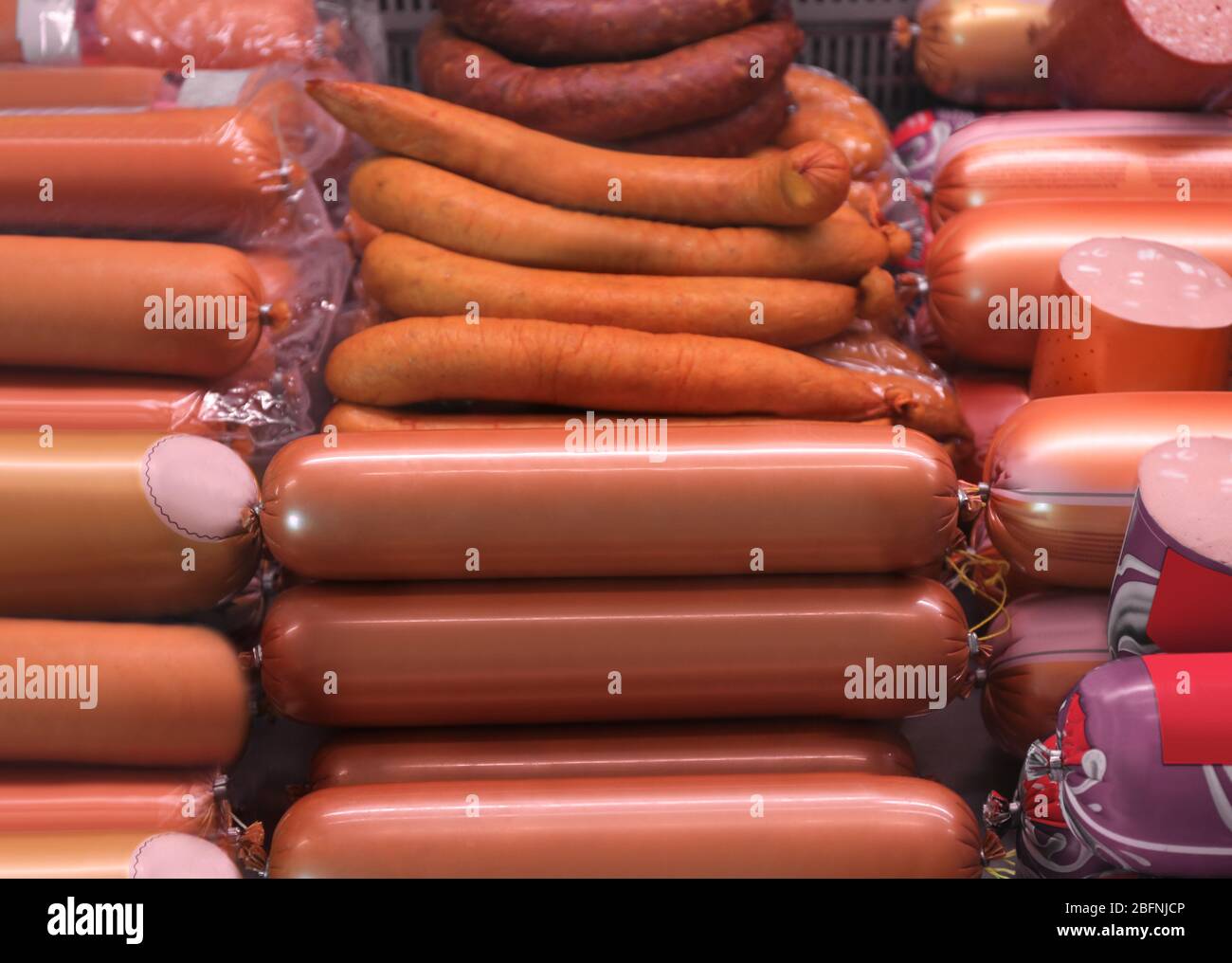 Assortment of sausages on display at market Stock Photo - Alamy