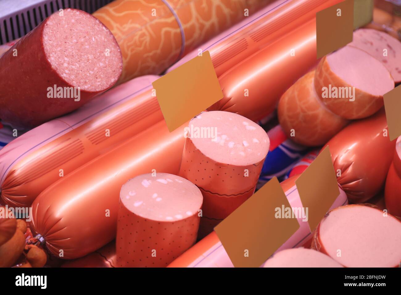 Assortment of sausages on display at market Stock Photo - Alamy