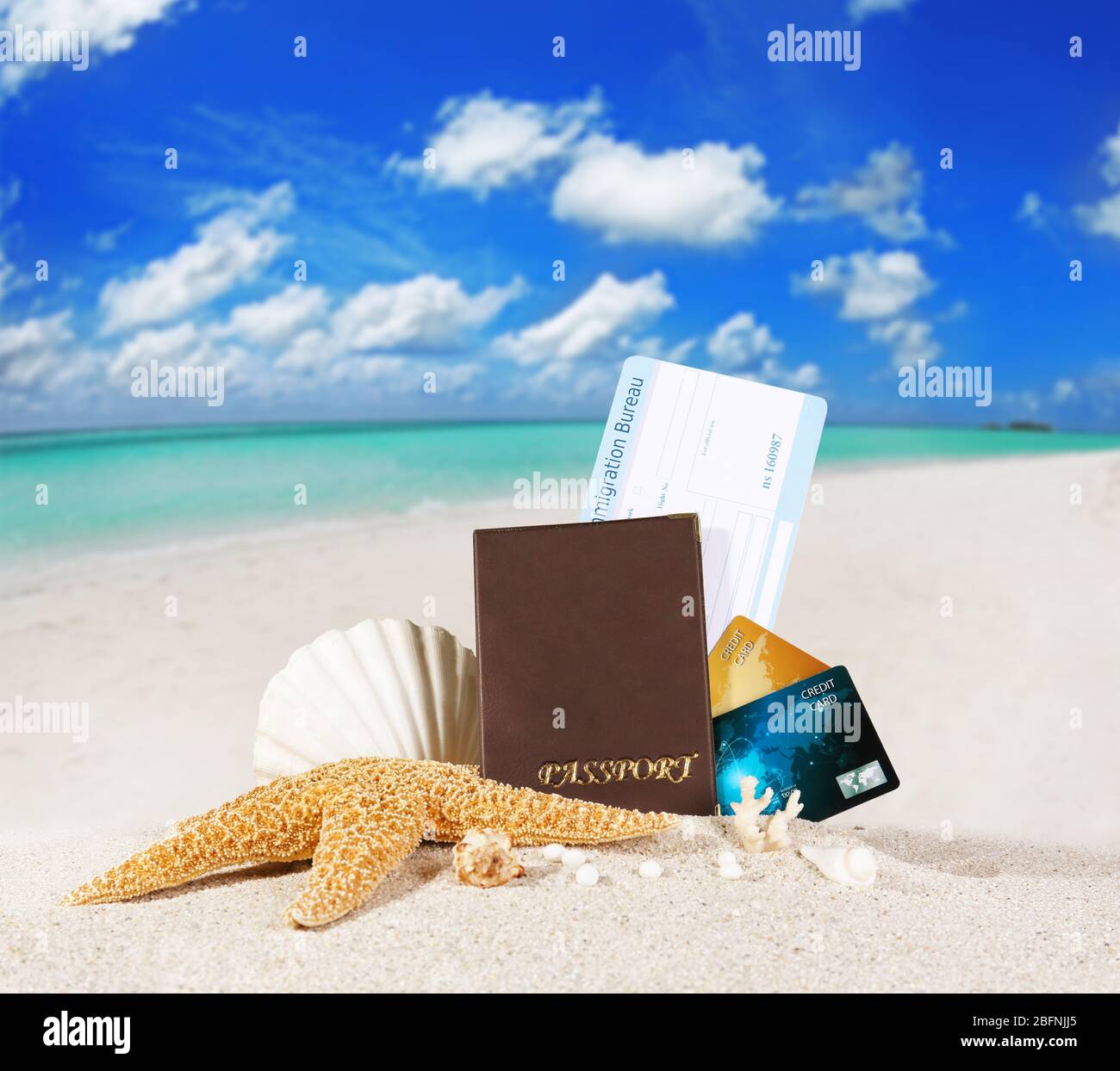 Composition with credit cards on tropical beach Stock Photo - Alamy