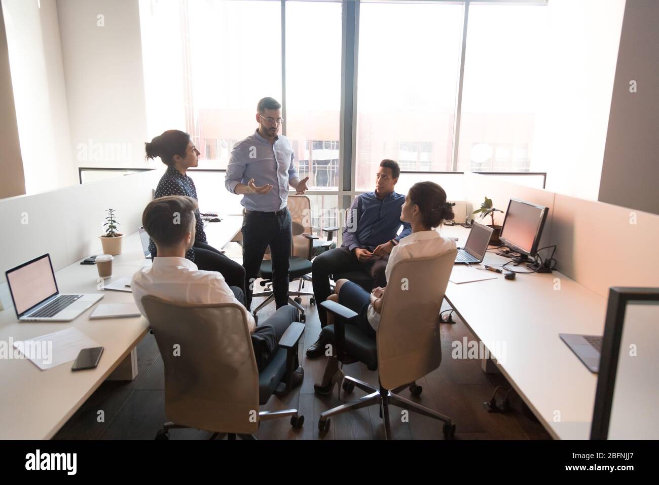 Ceo and corporate team gather together brainstorming in coworking Stock ...