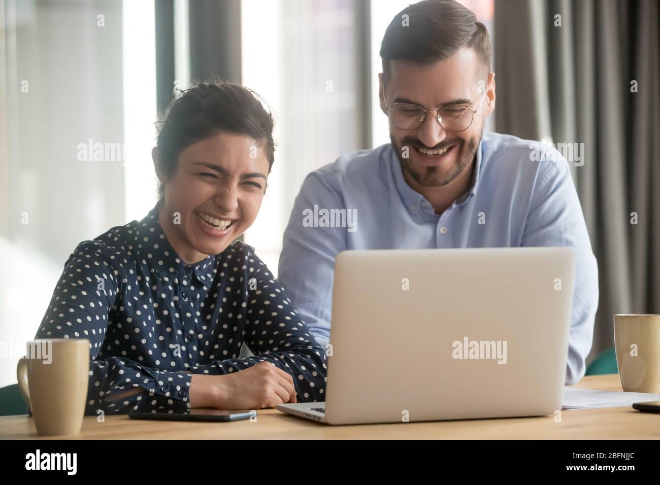 Analyzing joking hi-res stock photography and images - Alamy