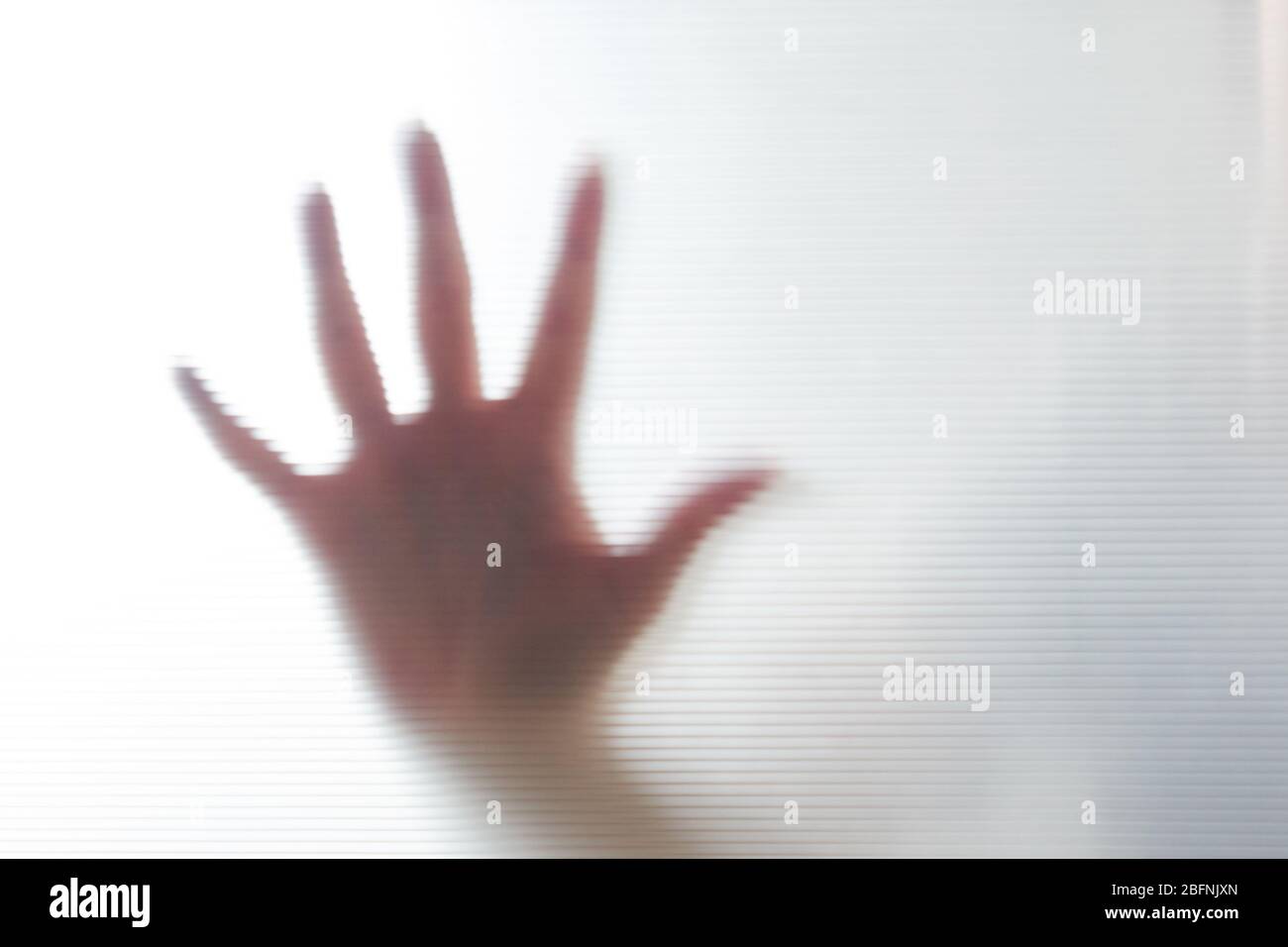Diffused silhouette of female hands through plastic Stock Photo - Alamy
