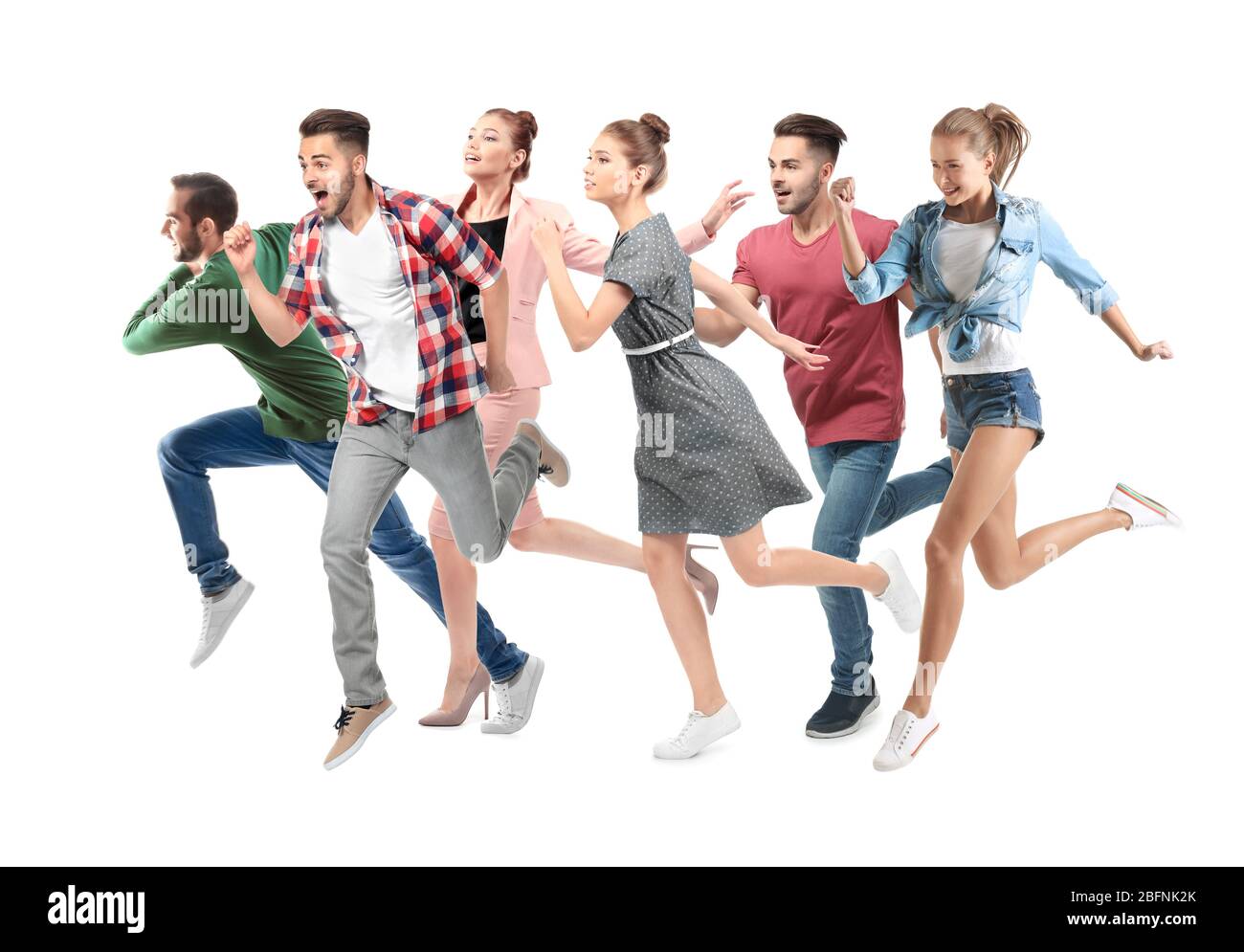 Group of running people on white background Stock Photo - Alamy