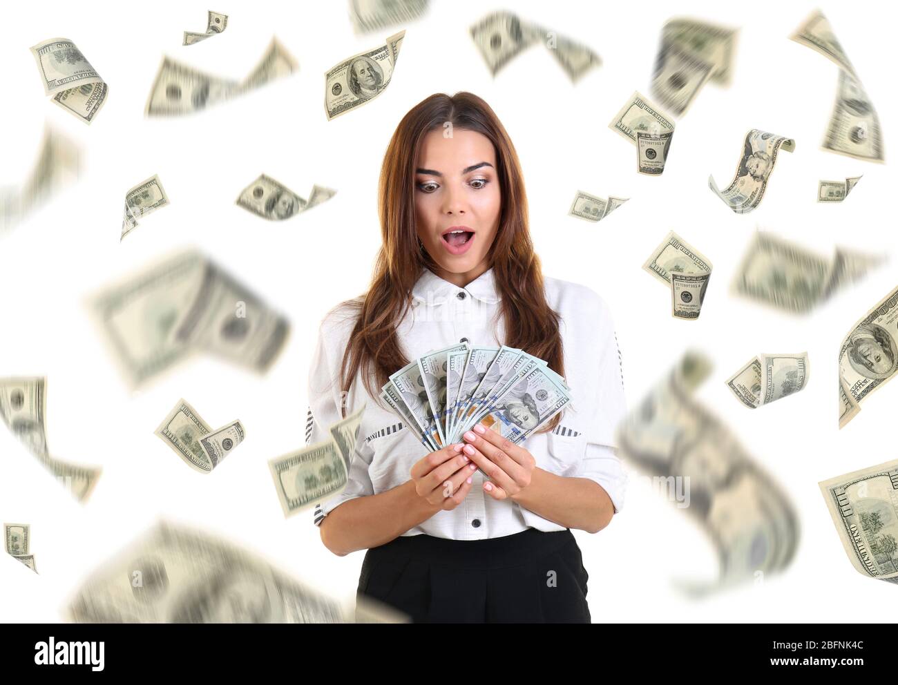 Young woman with money on white background Stock Photo - Alamy