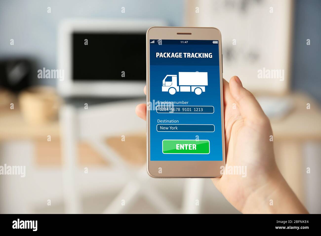 Woman tracking parcel with help of smartphone app at home Stock Photo ...