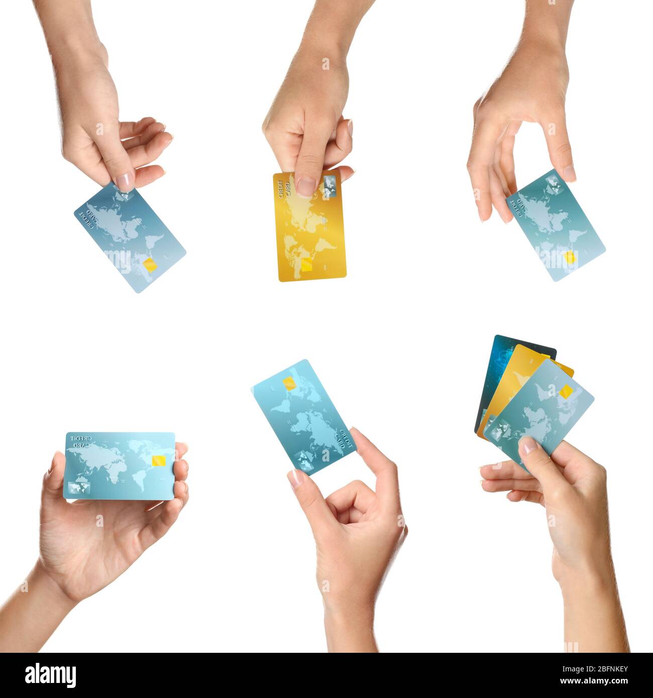 Women holding credit cards on white background Stock Photo - Alamy