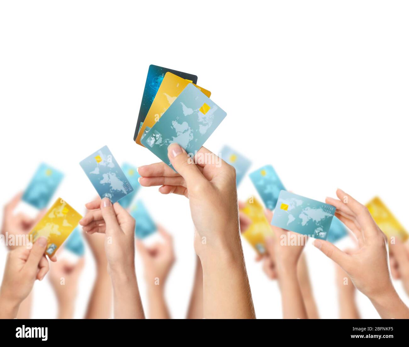 Women holding credit cards on white background Stock Photo - Alamy