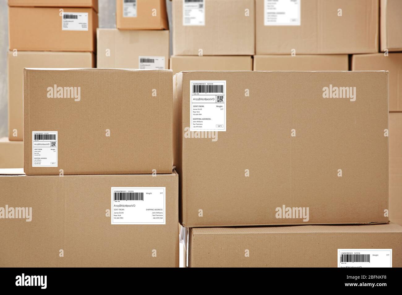 Parcels with tracking codes, closeup Stock Photo - Alamy