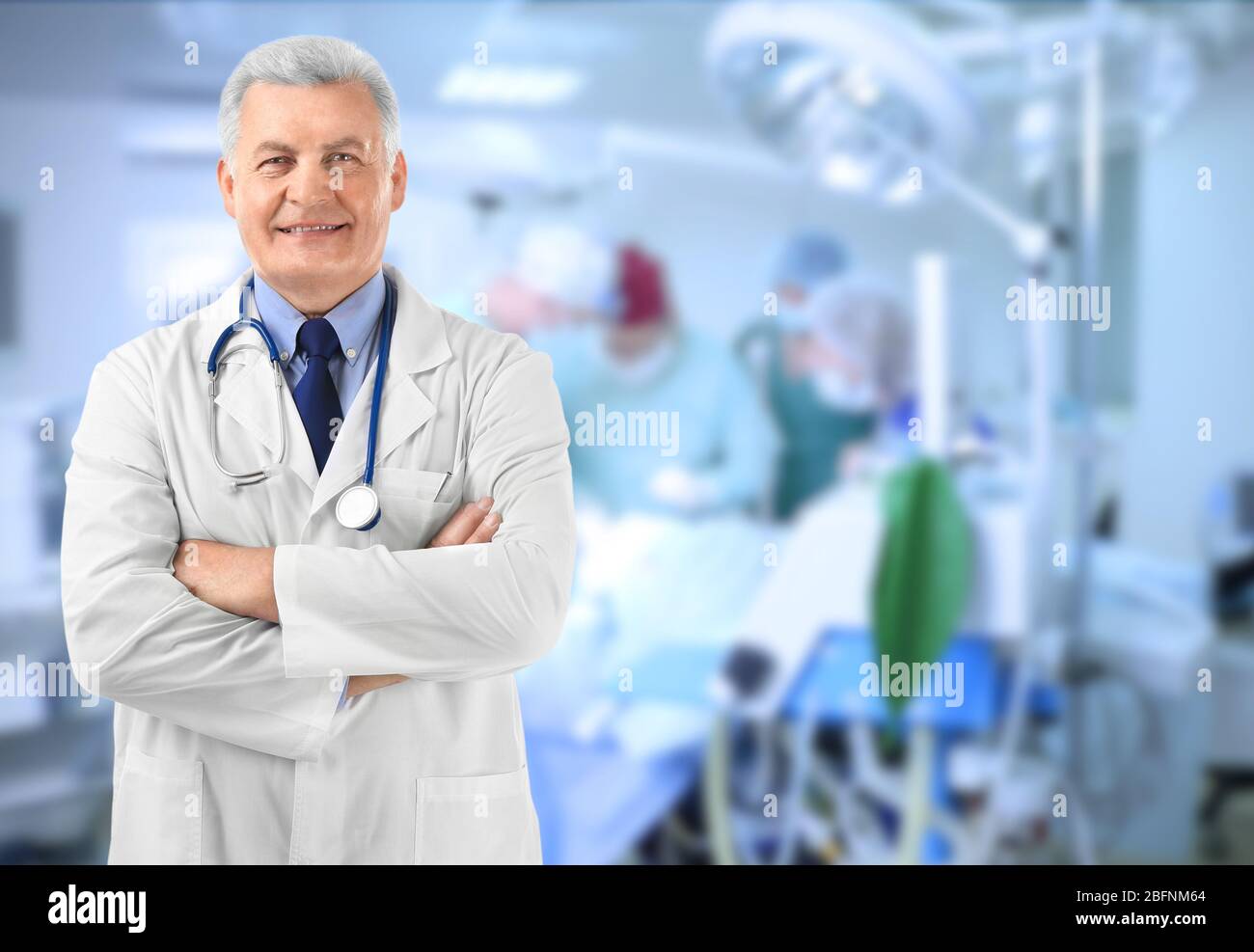 Owner of business in his private clinic Stock Photo - Alamy