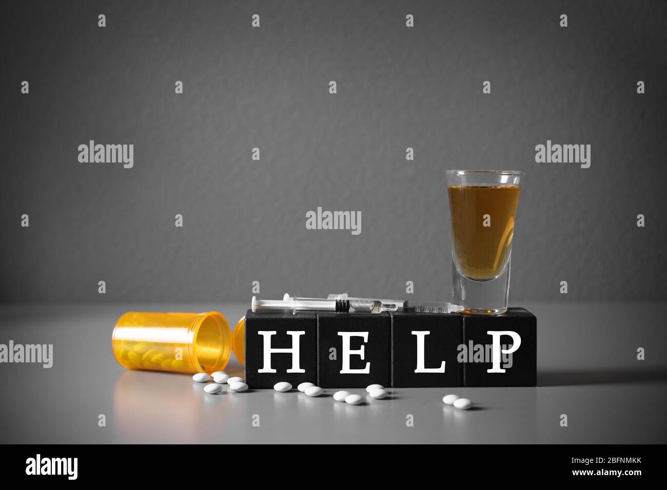 Strong drink, drugs and cubes with word HELP on table. Concept of ...