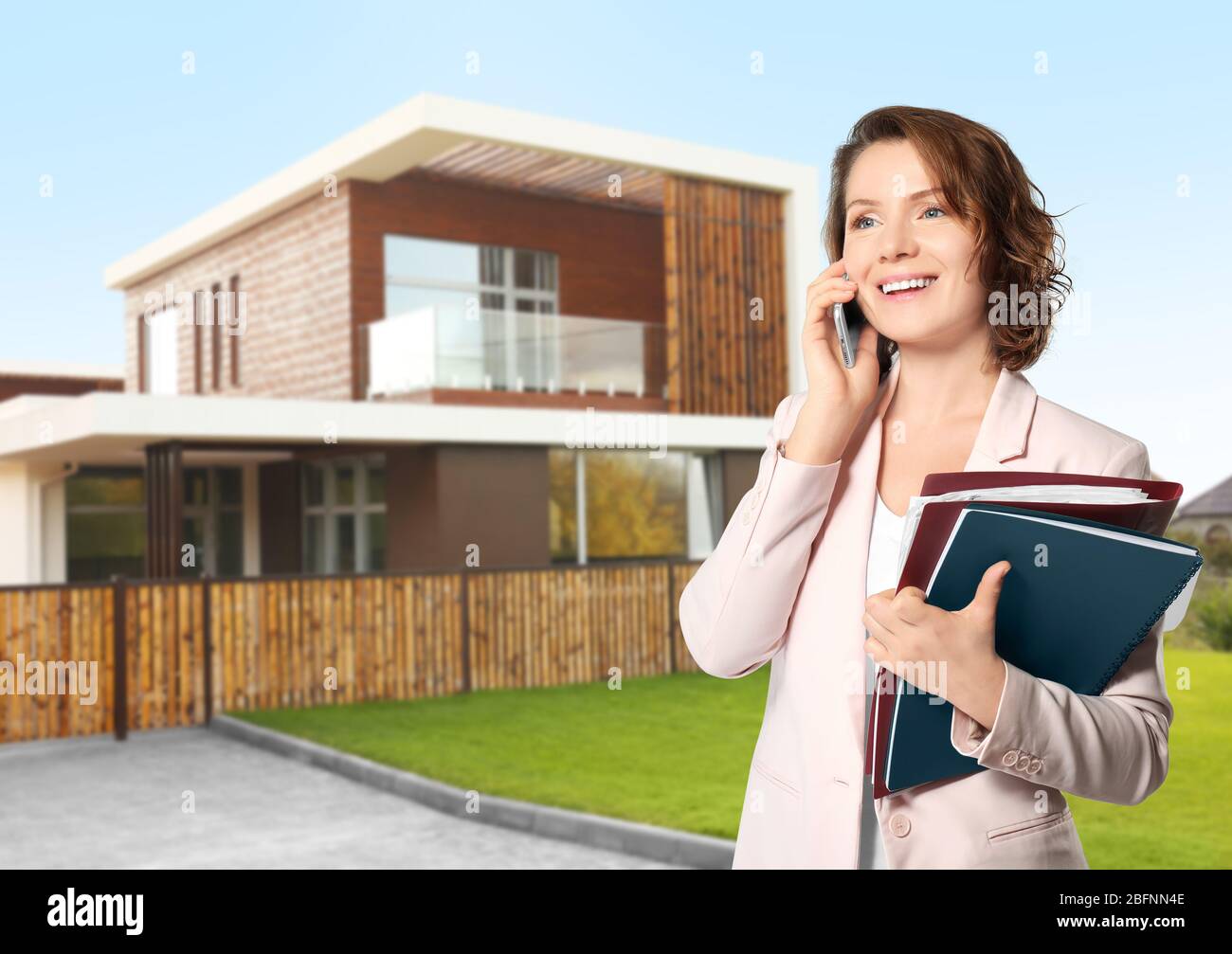 Woman talking home contractor hi-res stock photography and images - Alamy