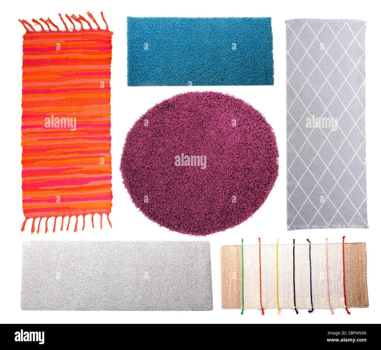 Set of different carpets on white background Stock Photo - Alamy