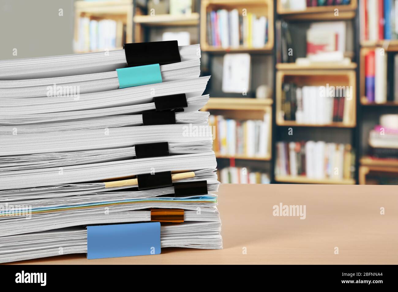 Stack of documents on table in archive Stock Photo - Alamy