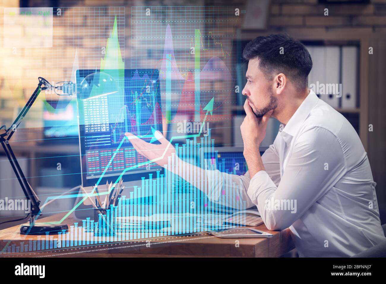 Stock exchange trader working in office Stock Photo - Alamy