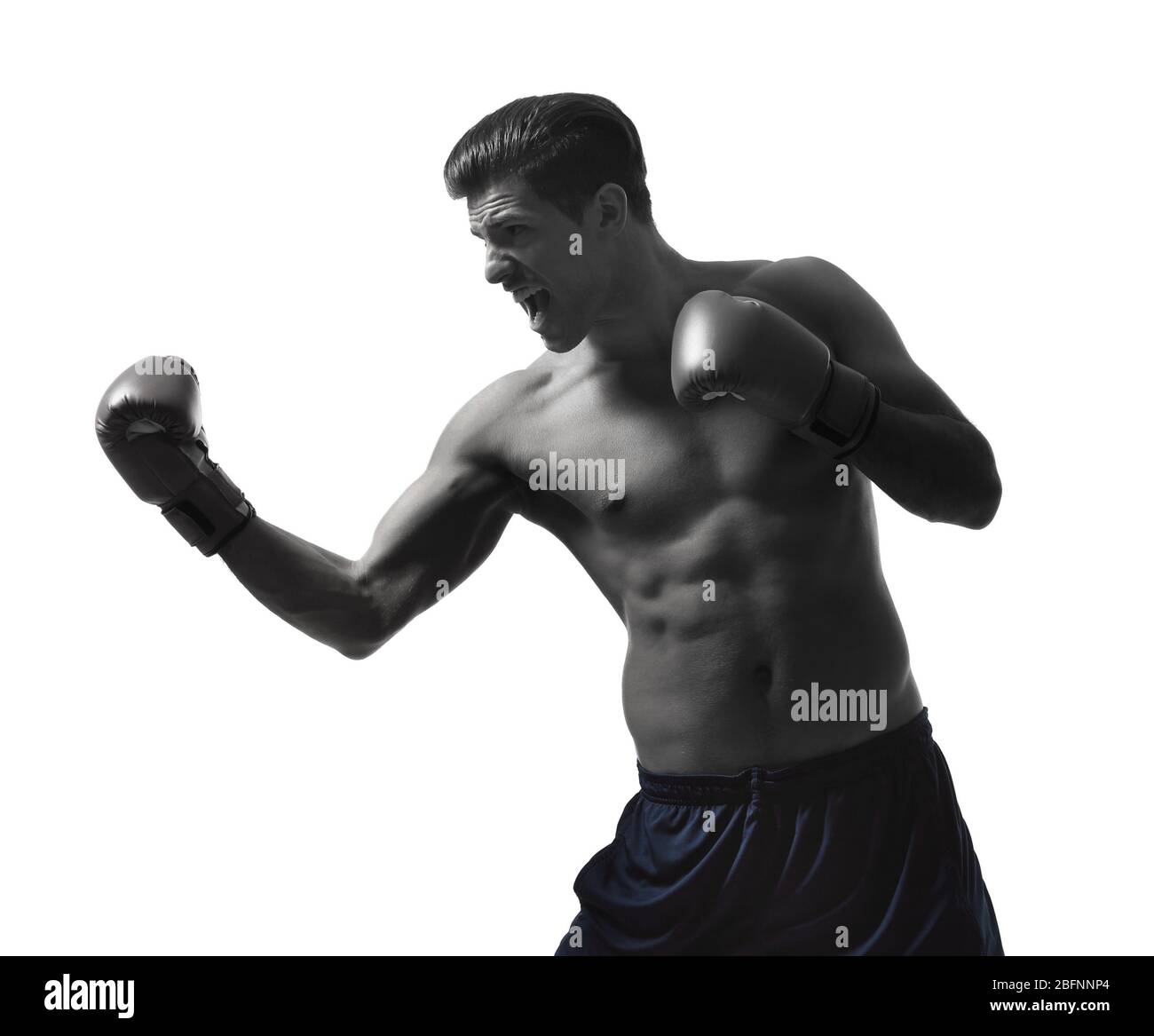 Young man with boxing gloves on white background Stock Photo - Alamy