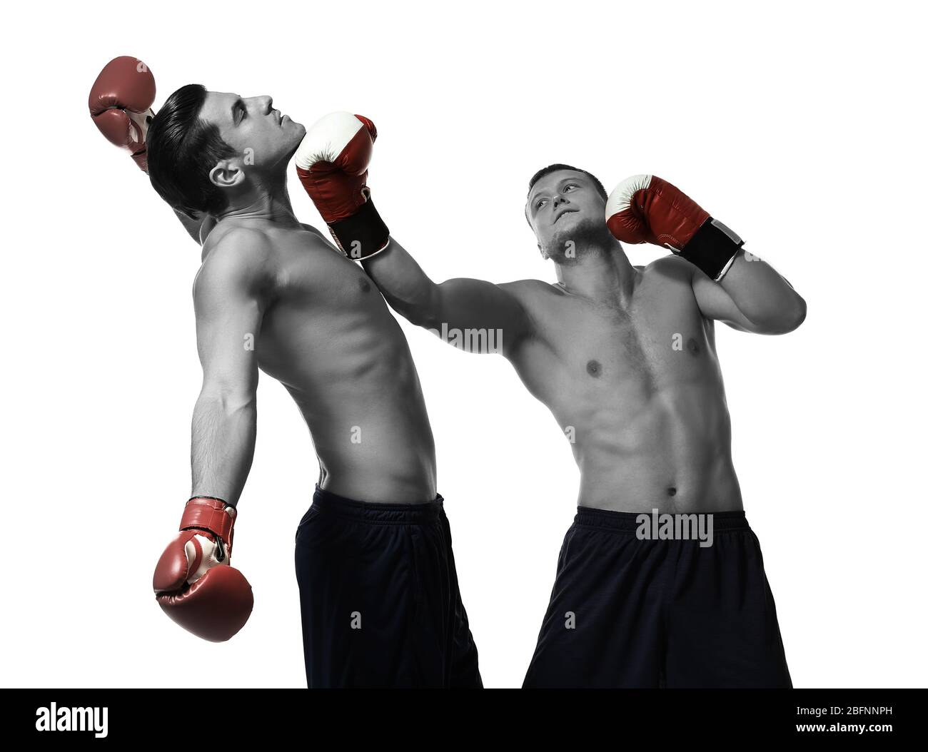 Young boxers fighting on white background Stock Photo - Alamy