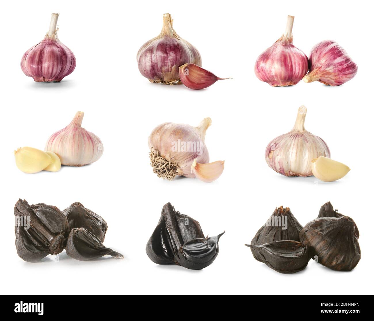 Set with aromatic black (Allium sativum) and white garlic bulbs on ...