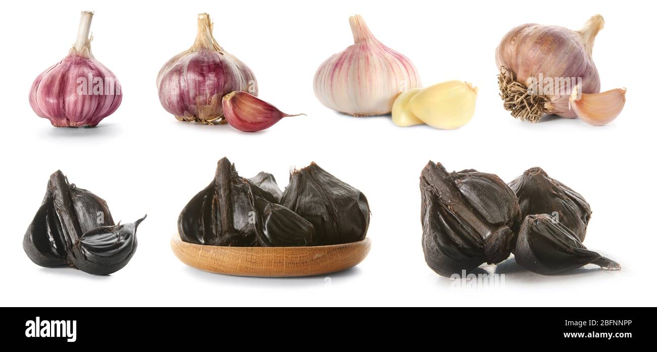 Set with aromatic black (Allium sativum) and white garlic bulbs on ...