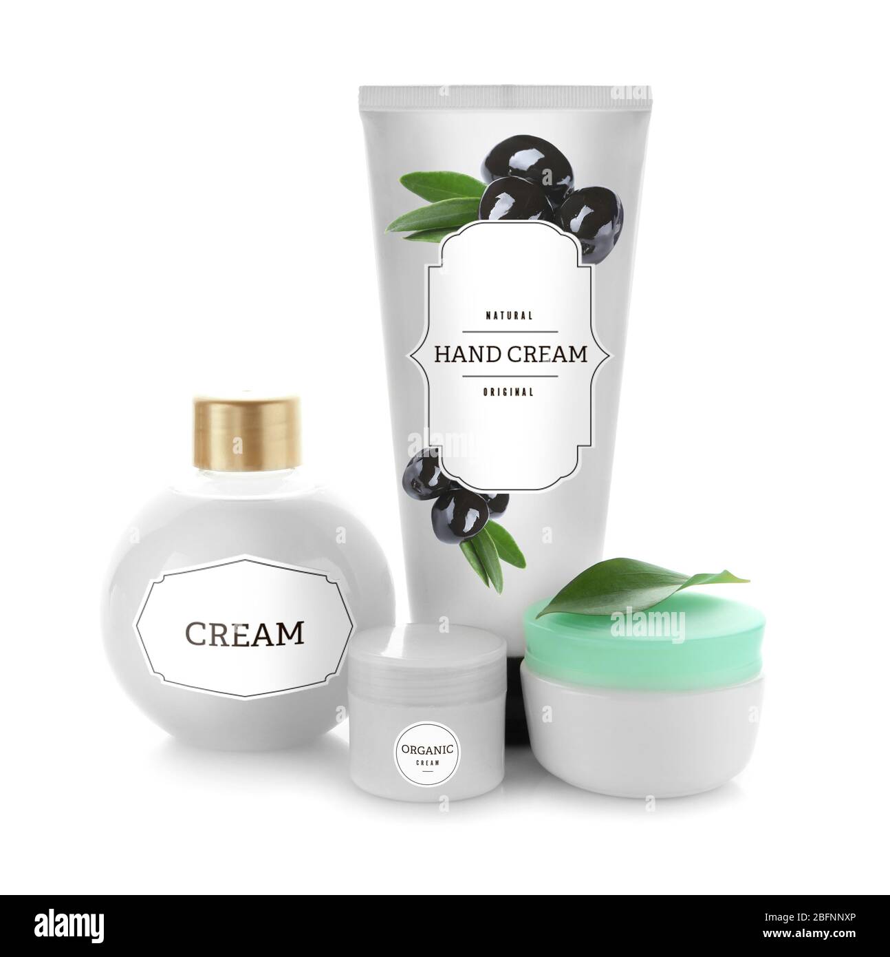 Body cream set with natural extracts on white background Stock Photo ...