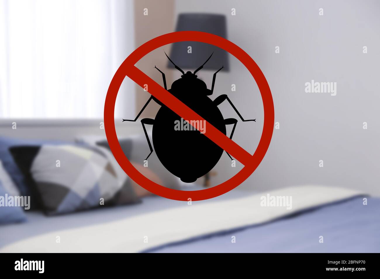 Stop bug sign and clean bed in room Stock Photo - Alamy