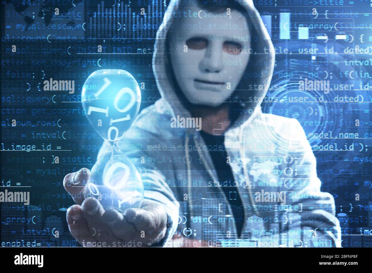 Hacker in mask holding hourglass and code on dark background. Concept ...