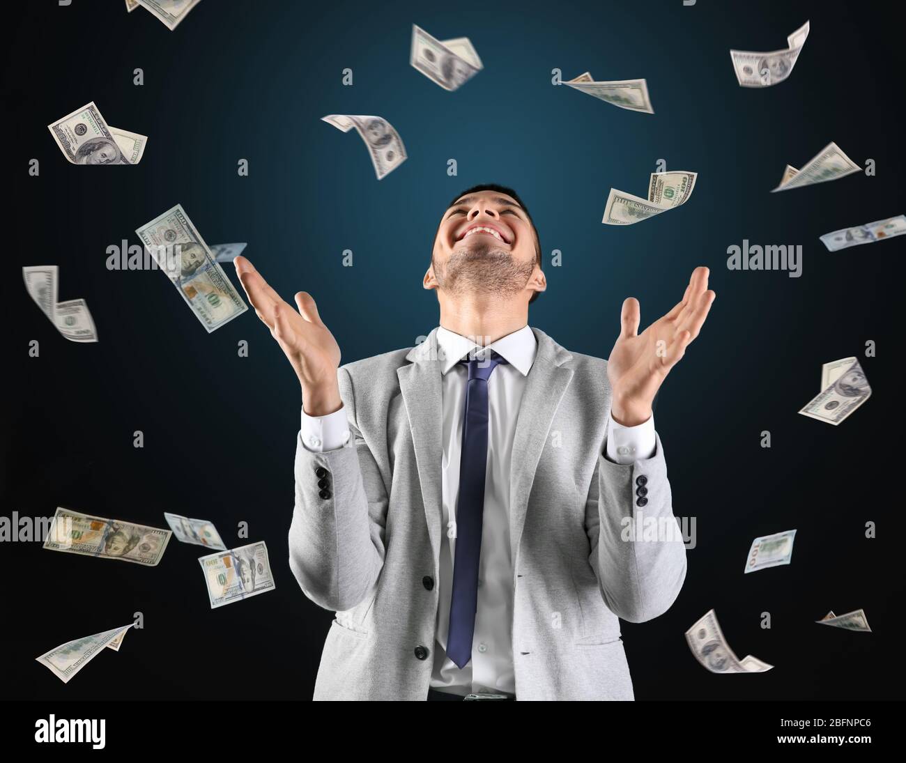 Successful stock broker with flying money on color background Stock ...