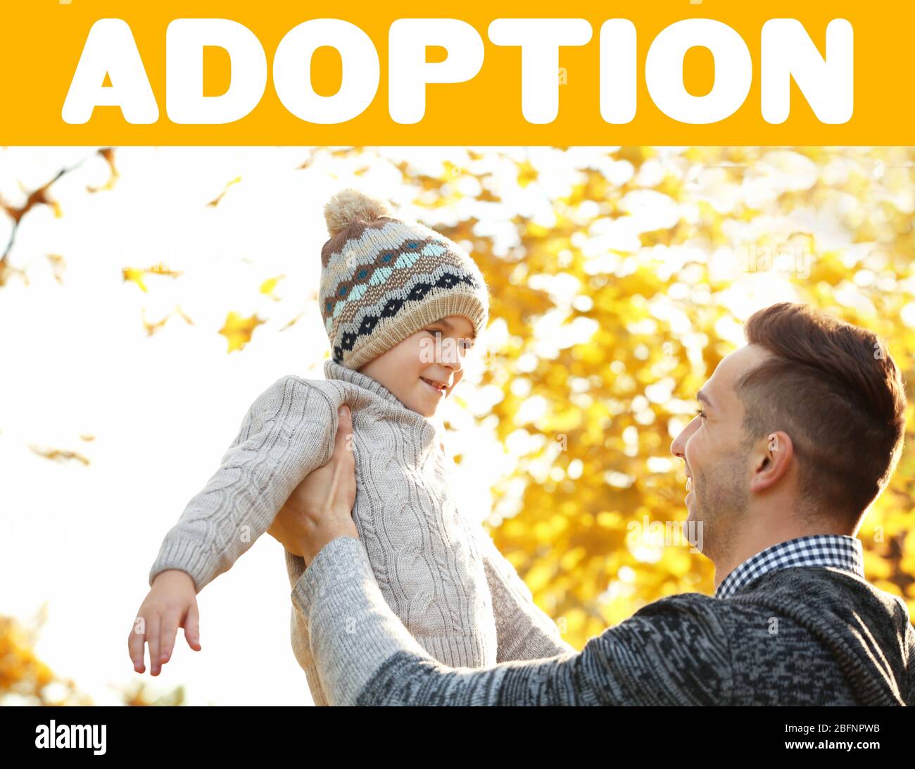 Adoption concept. Father and son playing outdoor Stock Photo - Alamy