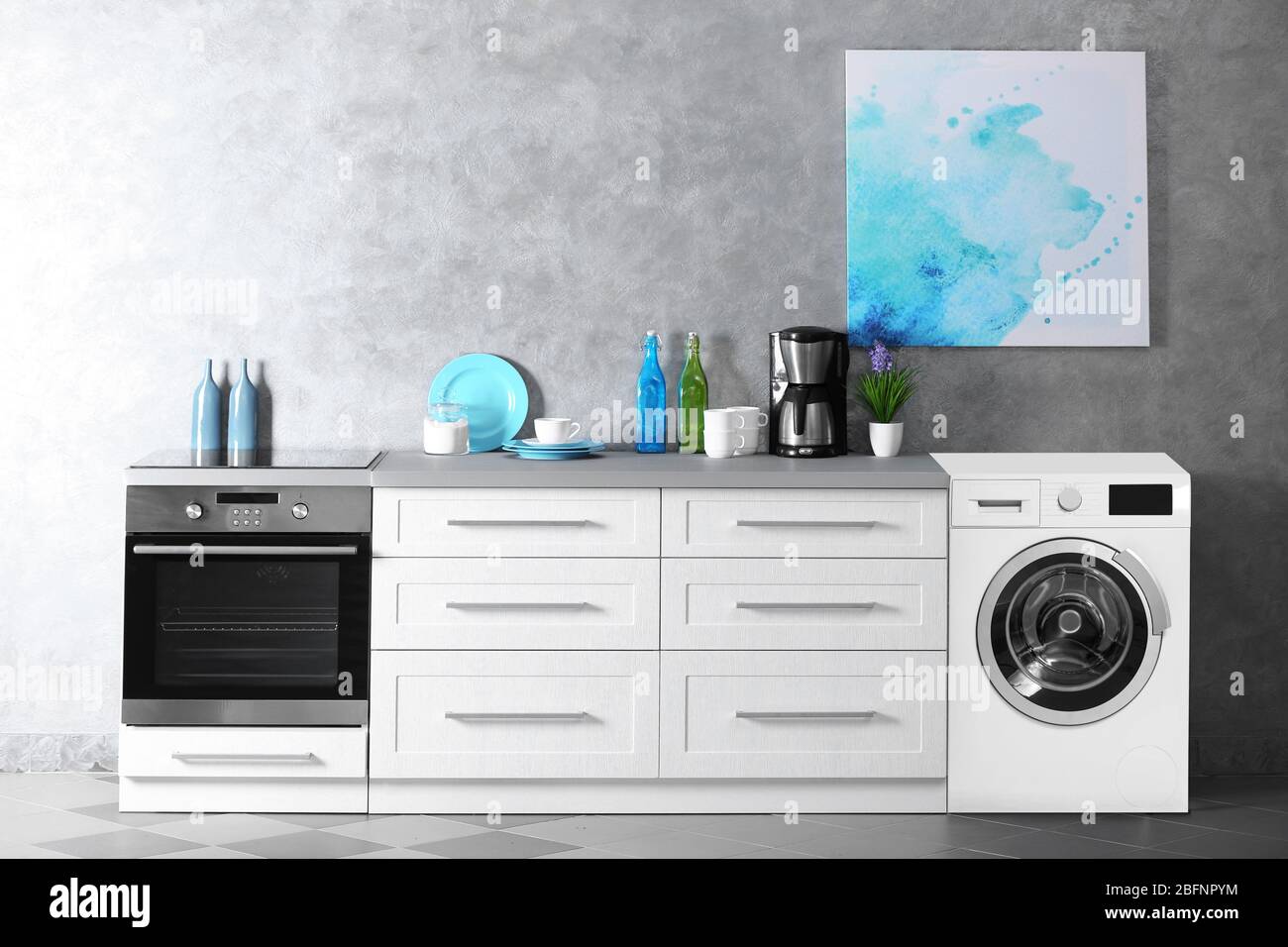 Interior of modern kitchen with washing machine. Laundry day Stock ...