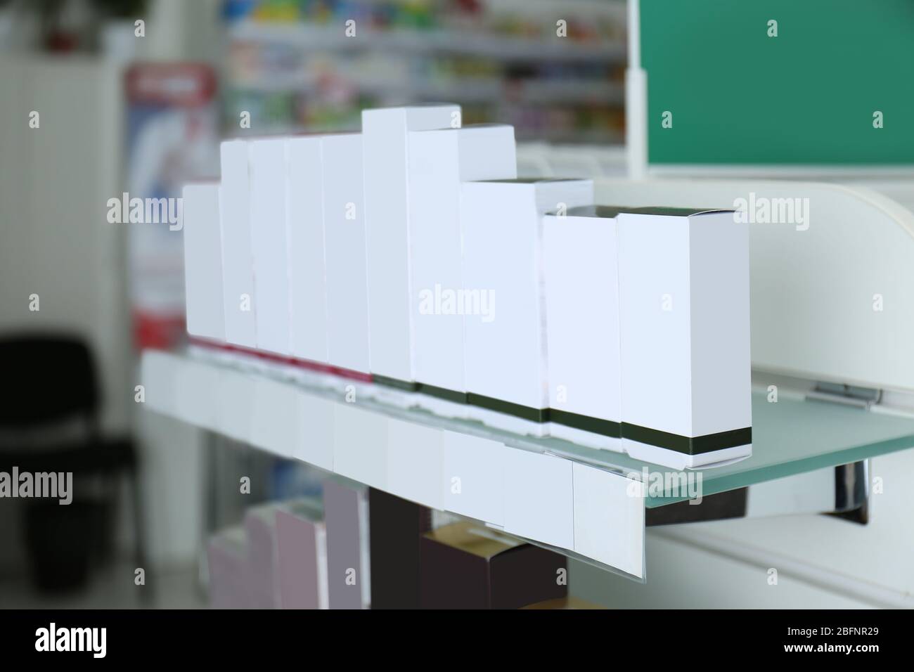 Various products on shelves at store Stock Photo - Alamy